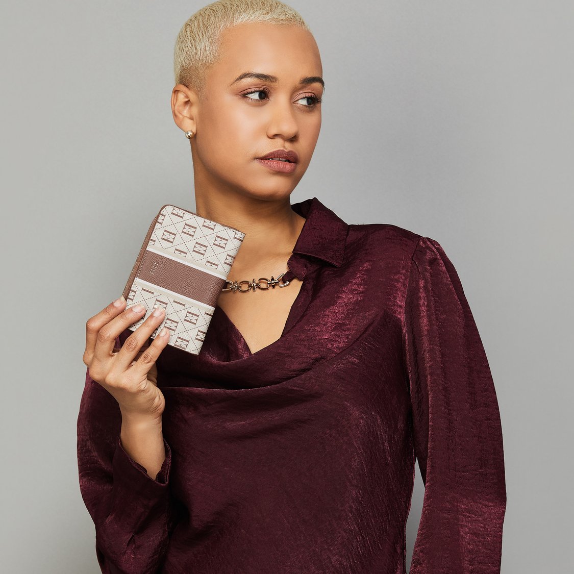 Buy ELLE Monogram Zip-Around Wallet from Elle at just INR 1499.0