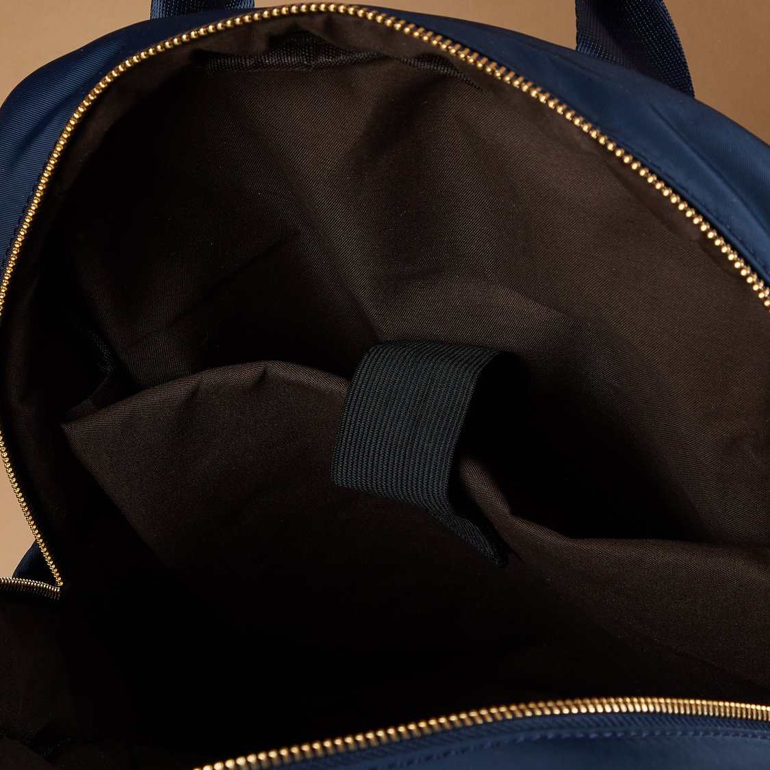 Buy GINGER Solid Laptop Backpack from Ginger at just INR 2499.0