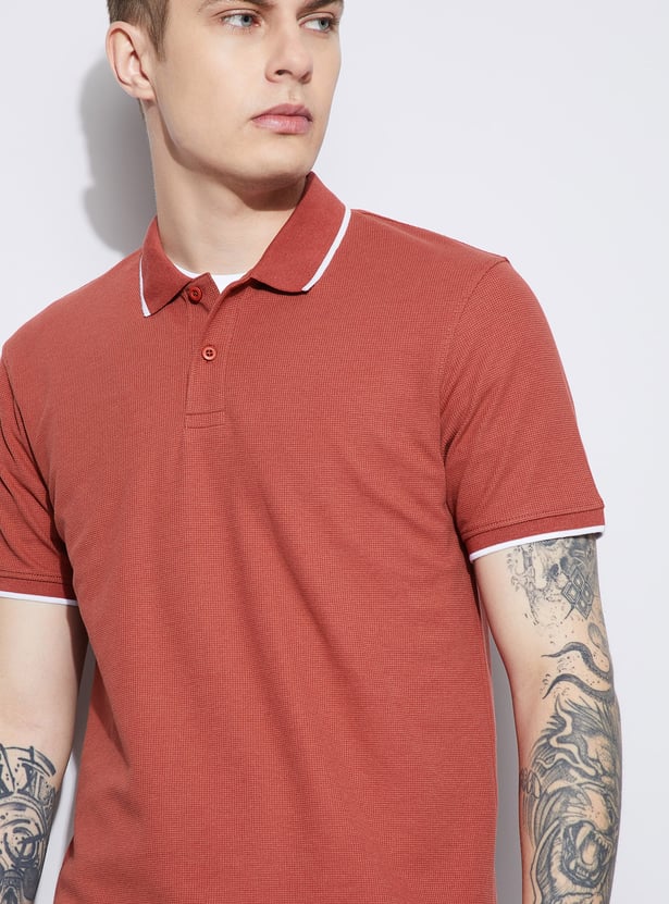 Buy FAME FOREVER Solid Polo T-shirt from Fame Forever at just INR 899.0