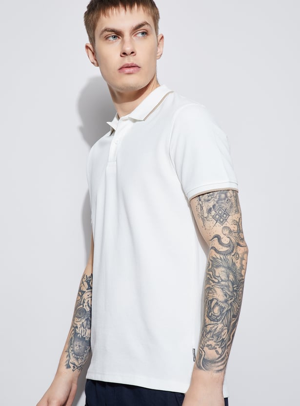 Buy FAME FOREVER Solid Polo T-shirt from Fame Forever at just INR 899.0