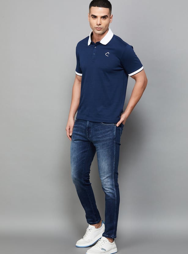 Buy WRANGLER Whiskered Slim Straight Jeans from Wrangler at just INR 3999.0