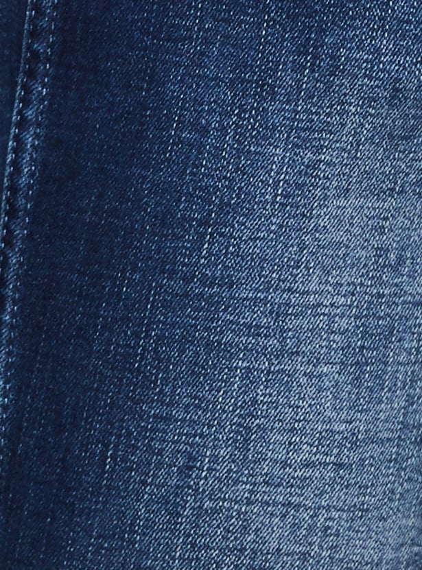 Buy WRANGLER Whiskered Slim Straight Jeans from Wrangler at just INR 3999.0