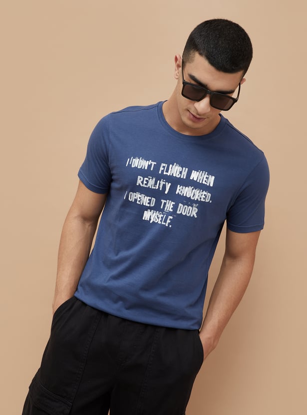 Buy FORCA Typographic Print T-shirt from Forca at just INR 499.0